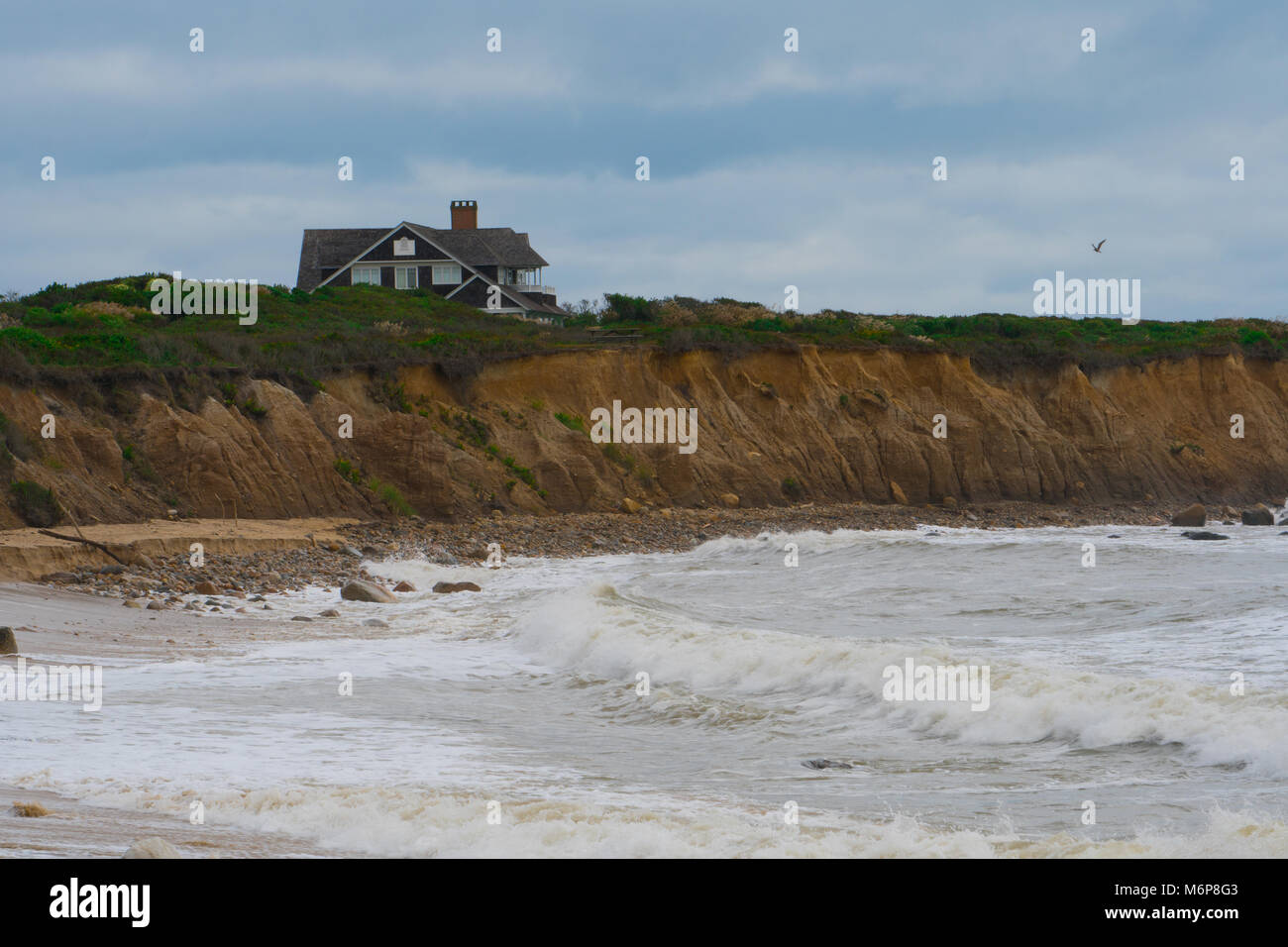Luxury beach front home on a bluff overlooking the ocean. Expensive ...
