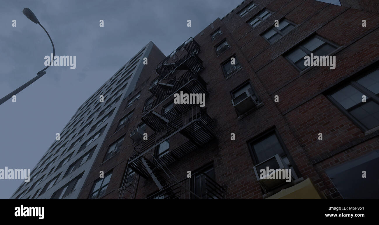Exterior photo NYC style apartment building above store front awnings ...