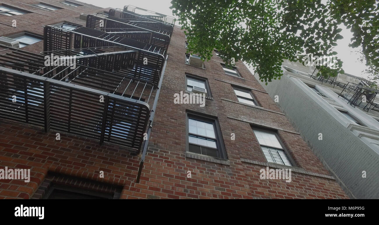 Vertical straight up view of typical generic brick apartment building ...