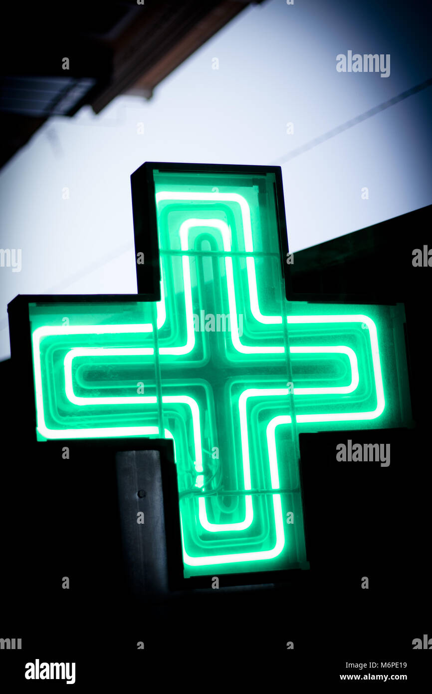 Luminous green cross. No people Stock Photo - Alamy