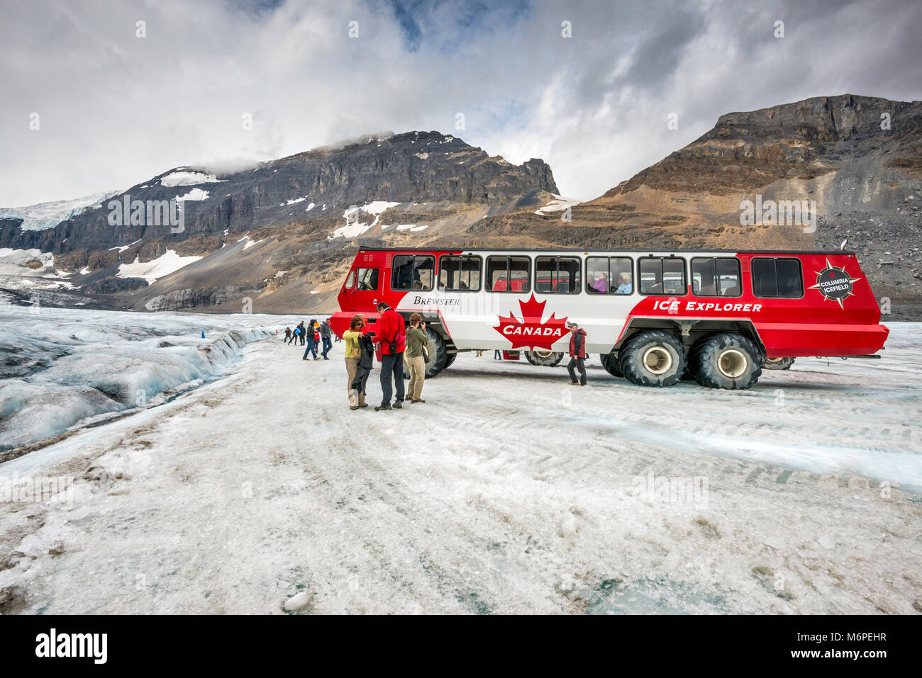 Visitors, snow coaches, at Athabasca Glacier, Jasper National Park ...