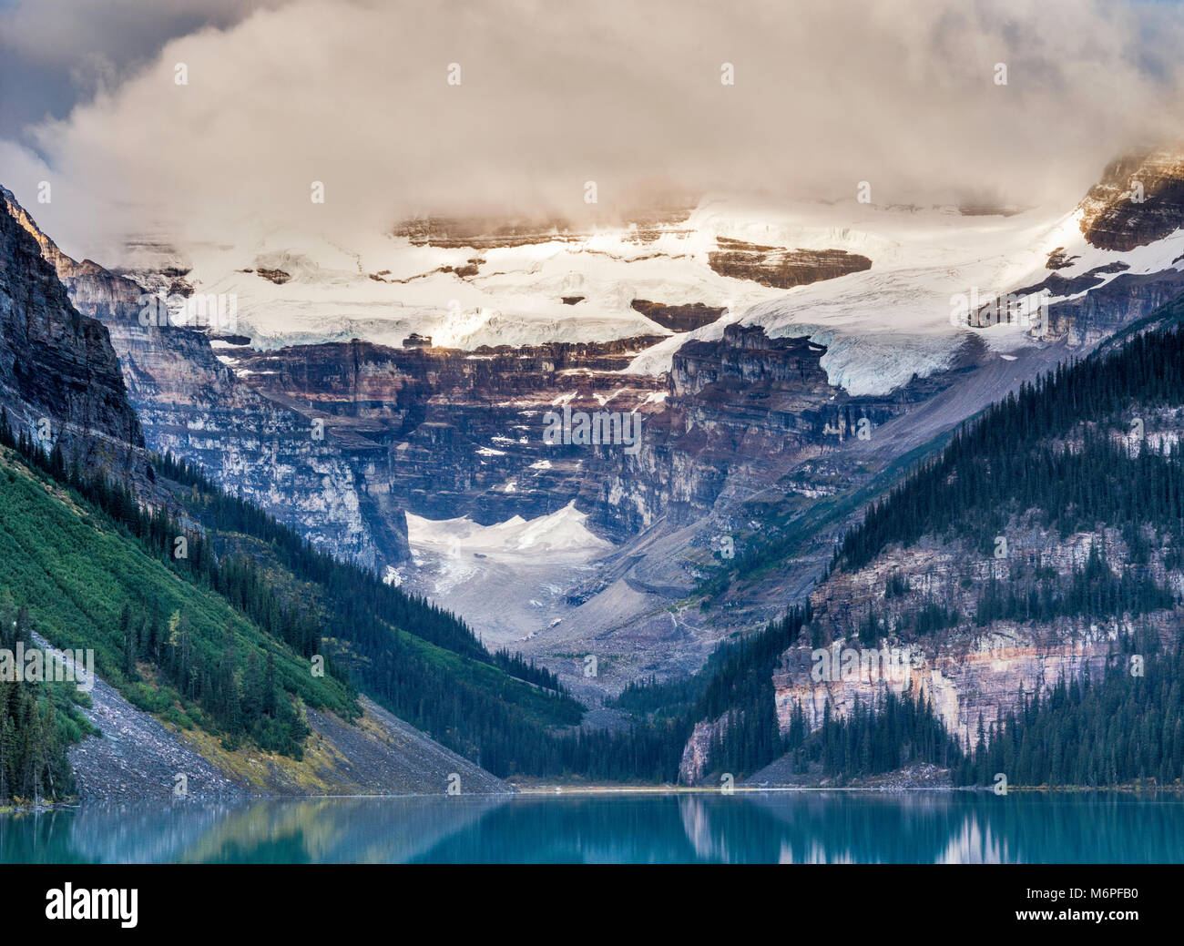 Mount Victoria in clouds over Lake Louise, Canadian Rockies, Banff ...
