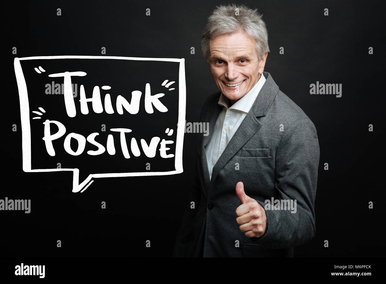 Aged man smiling and encouraging to positive thinking Stock Photo - Alamy