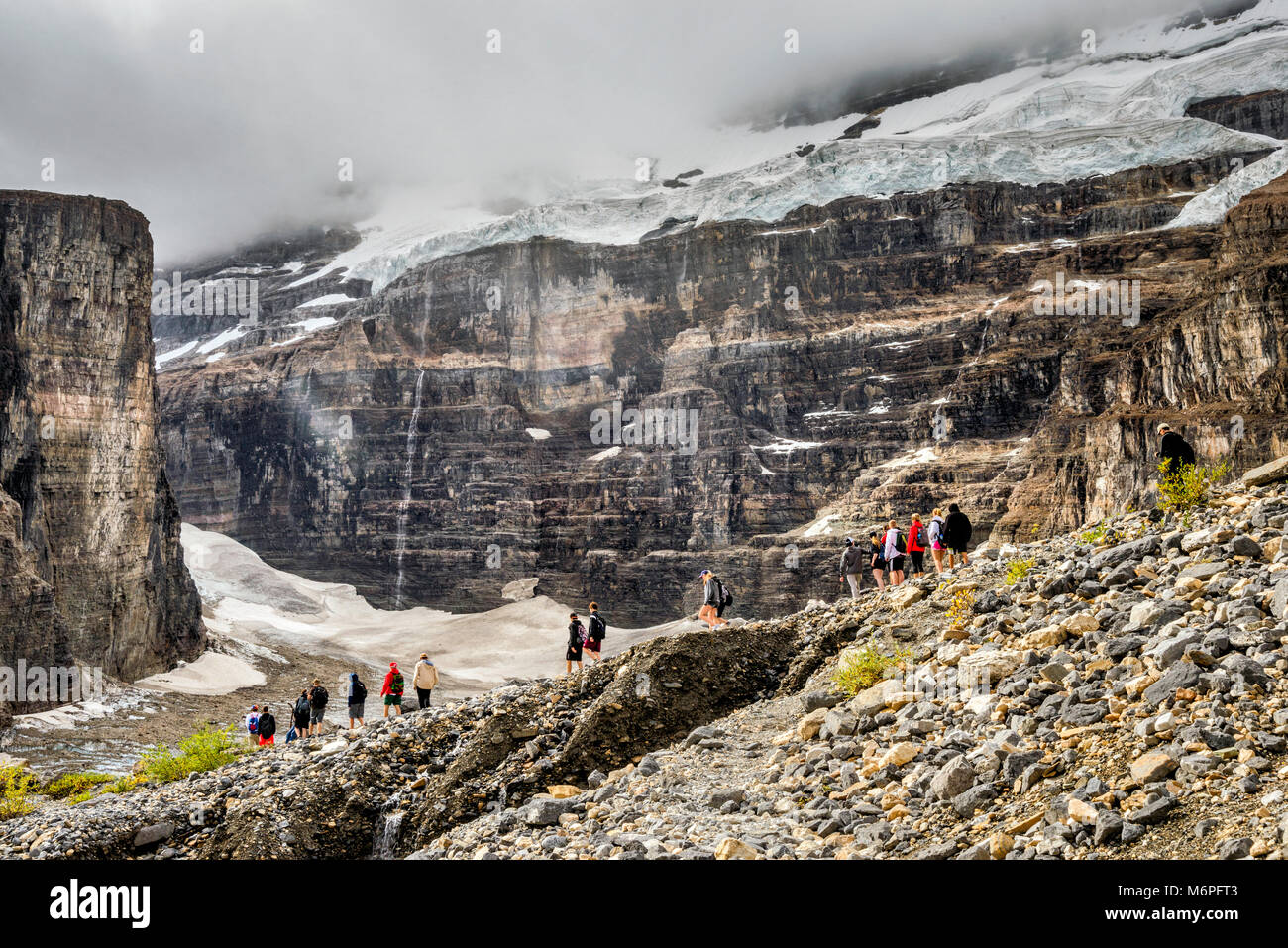 Hikers on Plain of the Six Glaciers Trail, Mount Victoria massif, Death ...