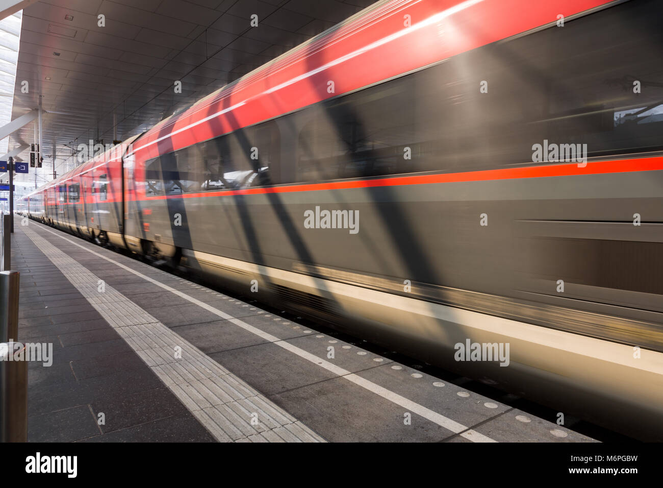 SALZBURG, AUSTRIA - March 03, 2018: Departing High speed OBB railjet ...