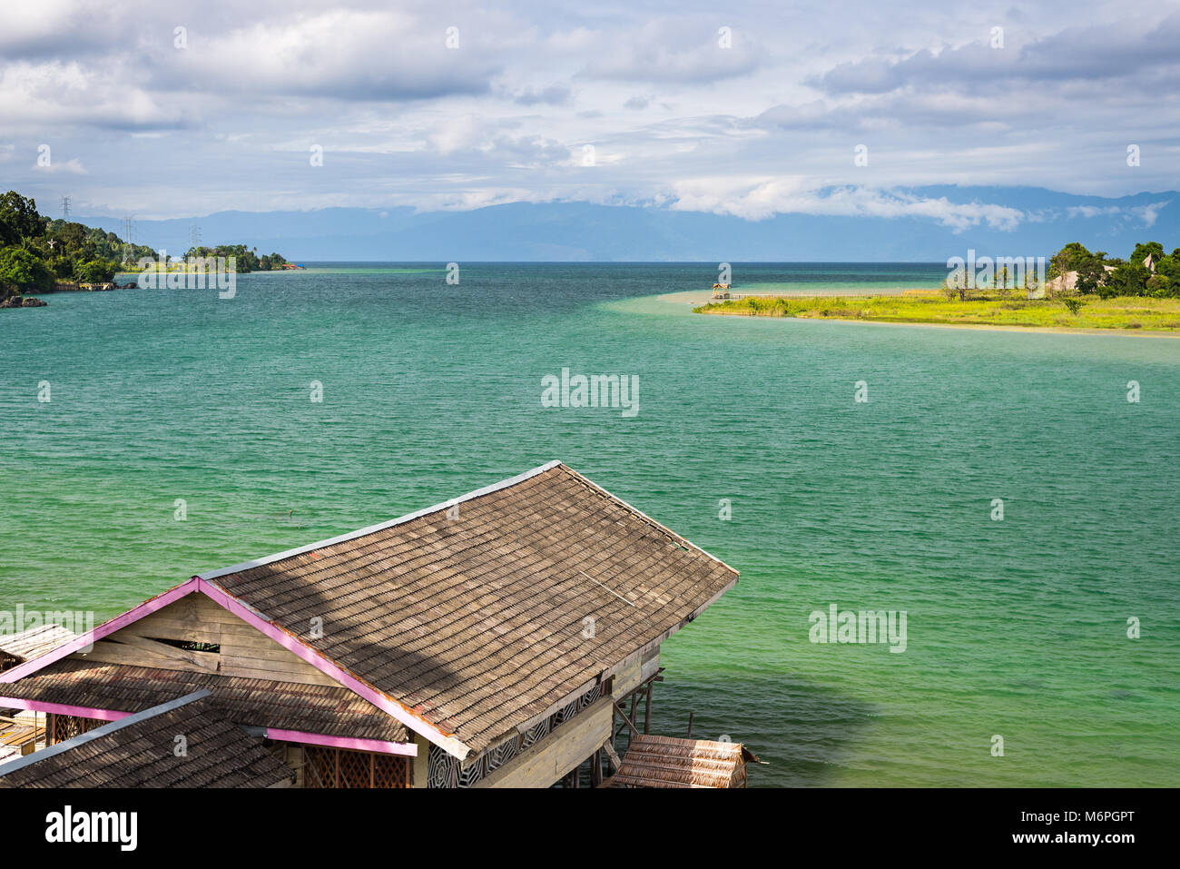 Village and stilt huts at Tentena on lake Poso in central Sulawesi ...