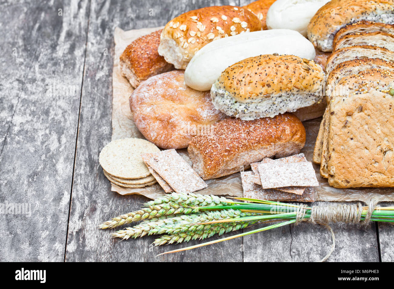 set of bakery products on the old wooden table Stock Photo - Alamy