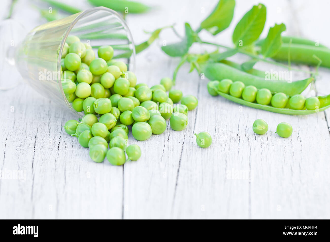 raw peas in the wine glass Stock Photo - Alamy