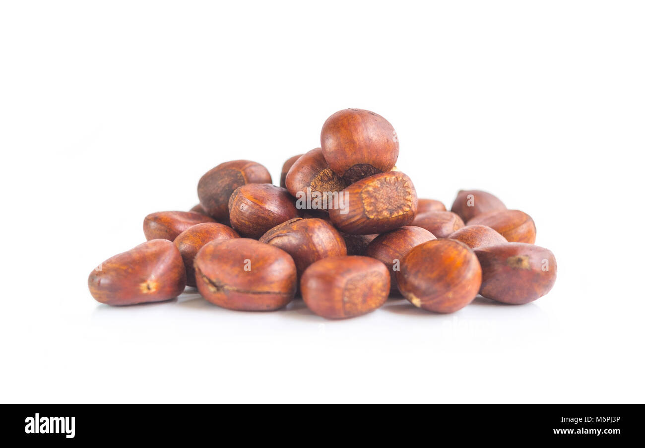 Heap of chestnuts isolated on white background. Selective focus Stock ...