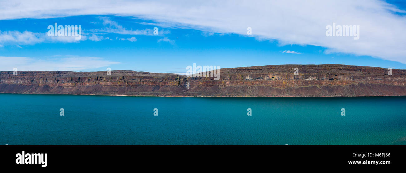 Columbia River Canyon Panorama with blue cloudy sky and deep green blue ...