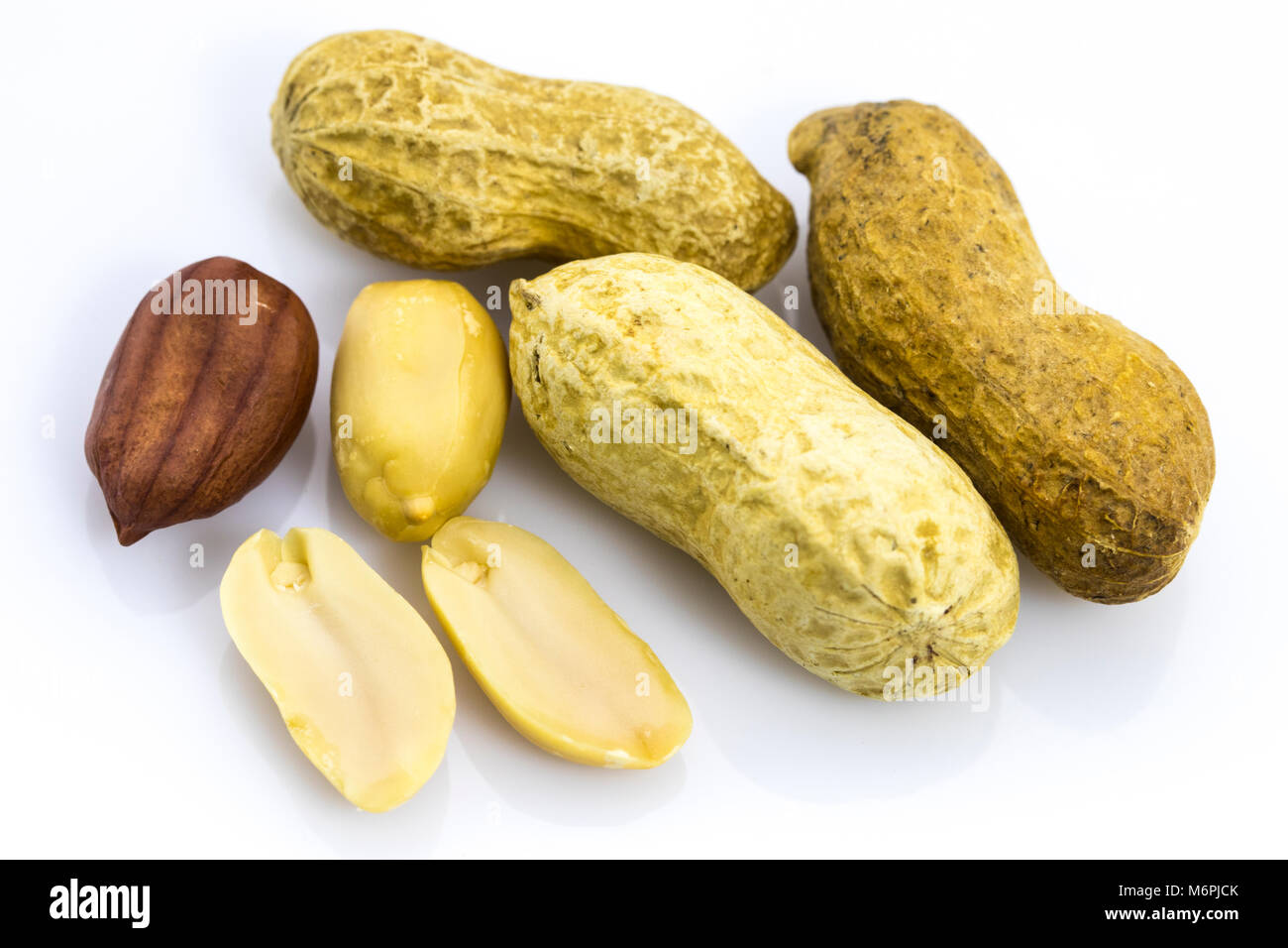Opened Peanuts on the white background, fracture single peanut Stock ...