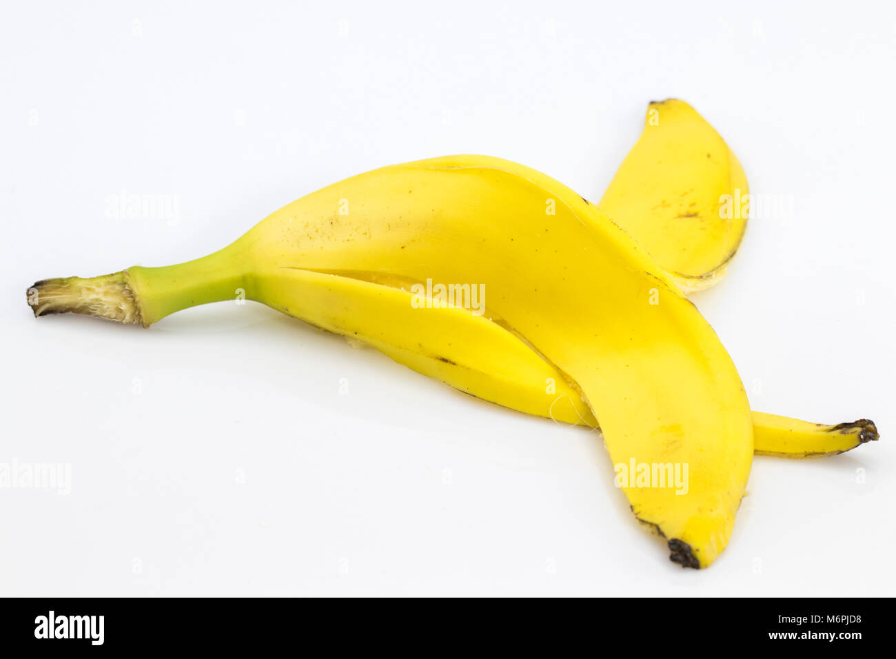 Banana peel on white background close up Stock Photo - Alamy