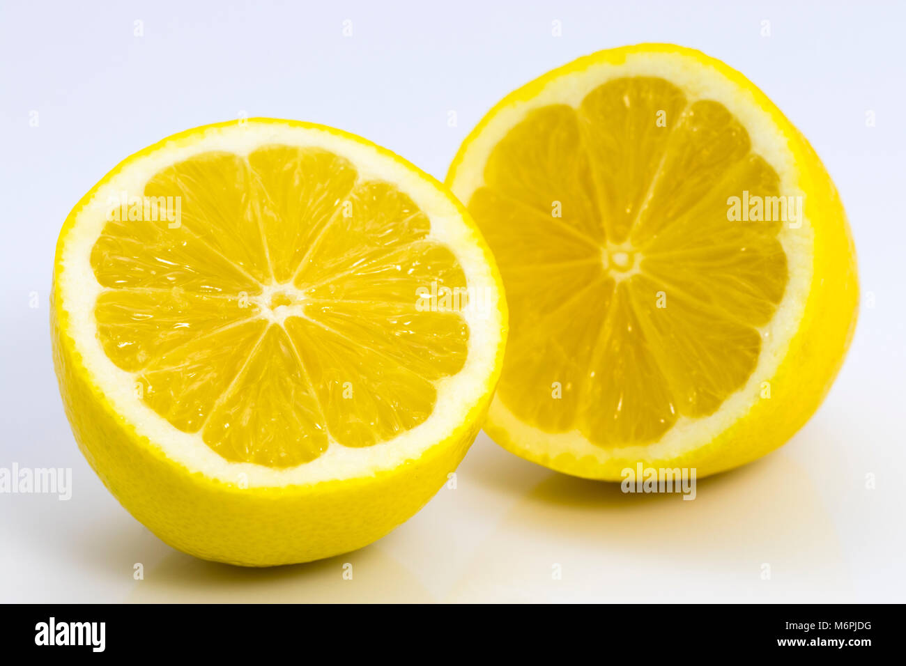 close up of fresh lemon slices on white background Stock Photo - Alamy