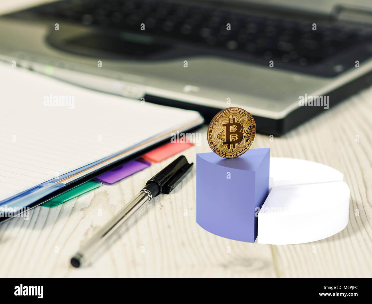 bitcoin sign on table with growth pie chart Stock Photo - Alamy