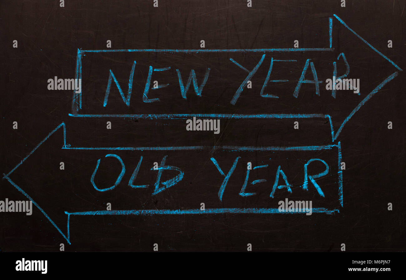 The old year or New Year signs drawn on the Board Stock Photo - Alamy