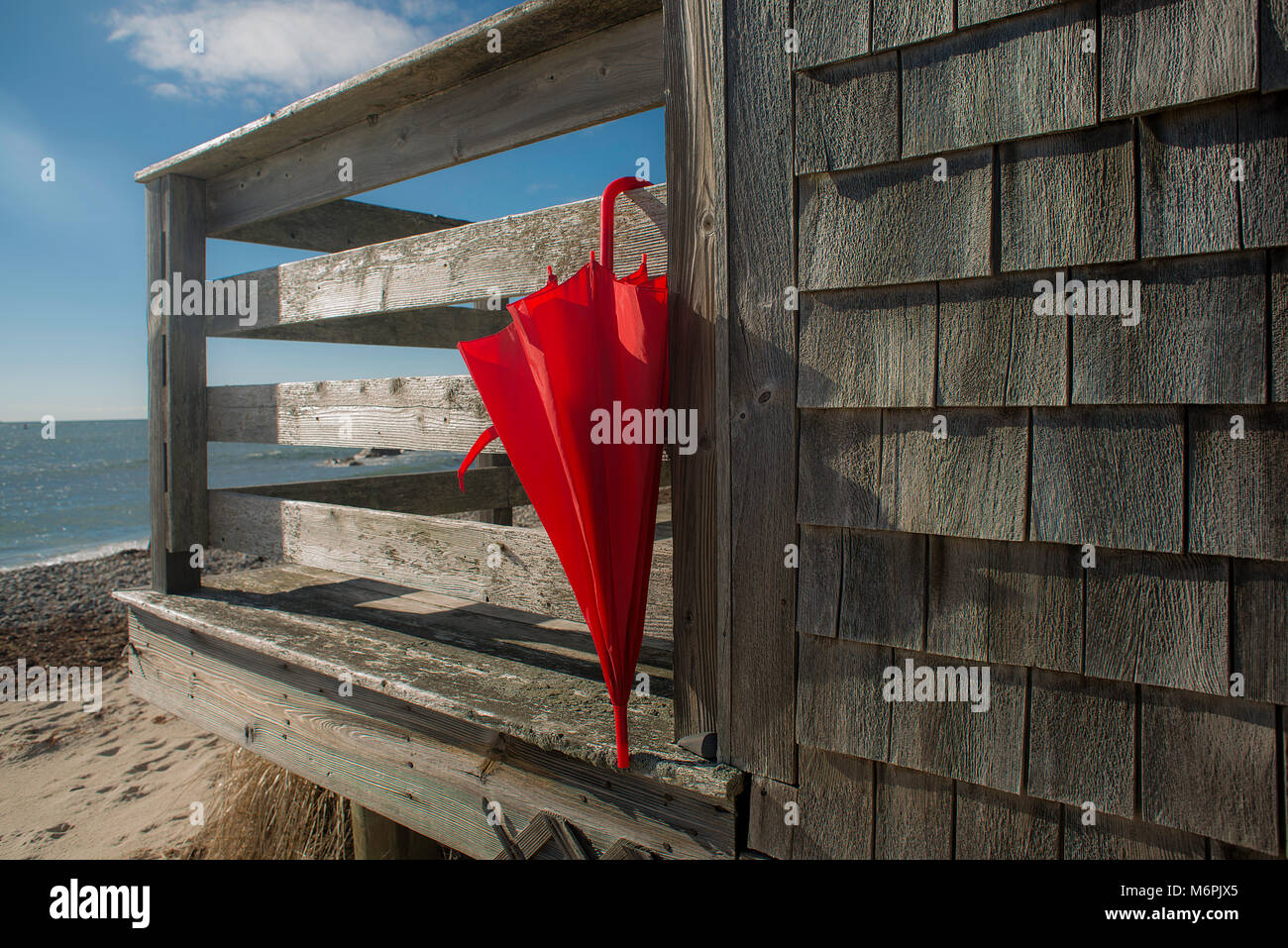 Red umbrella rain storm sun beach protect deck hang sky hi-res stock ...