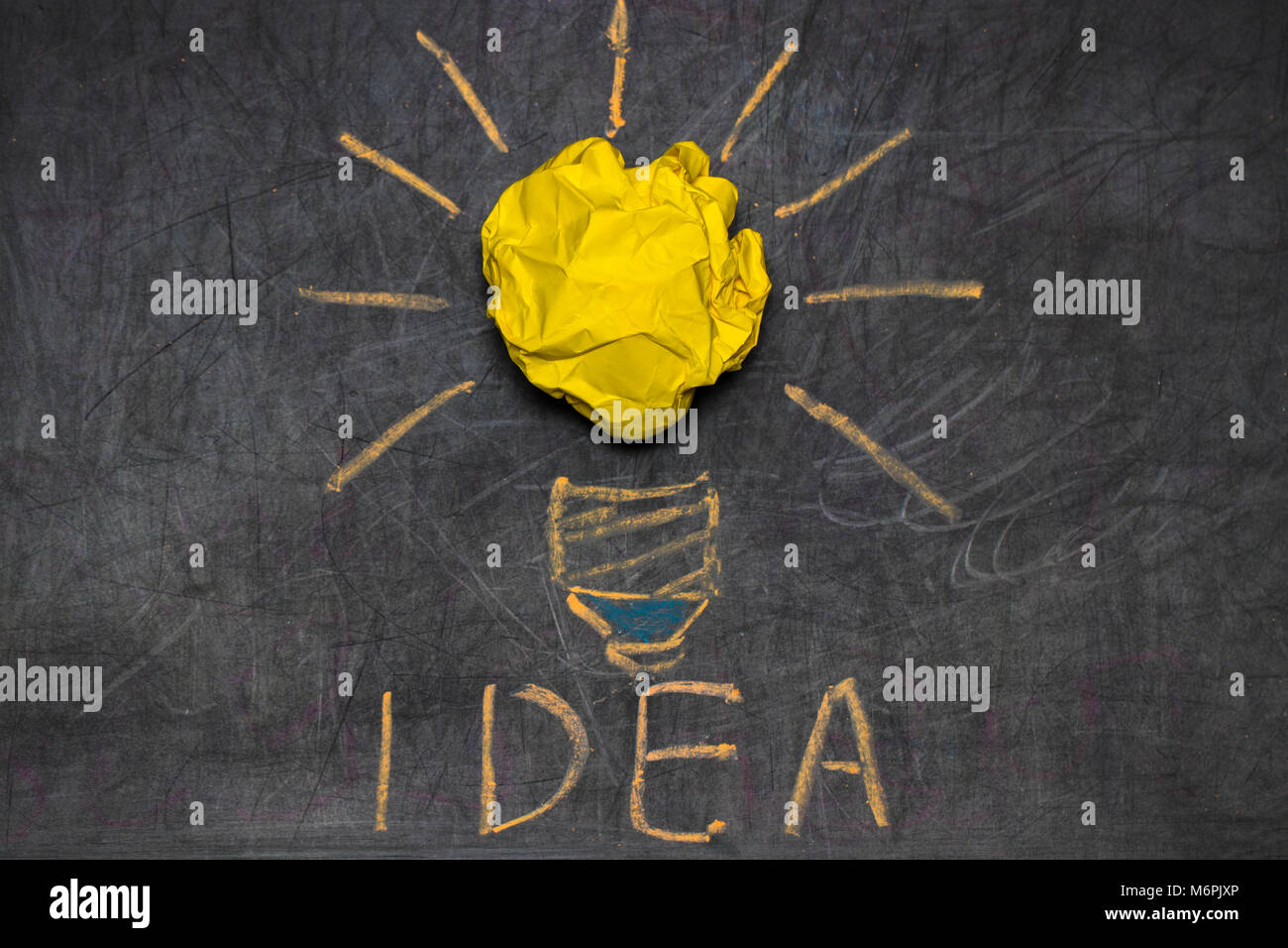 Inspiration concept crumpled color paper light bulb metaphor for good ...