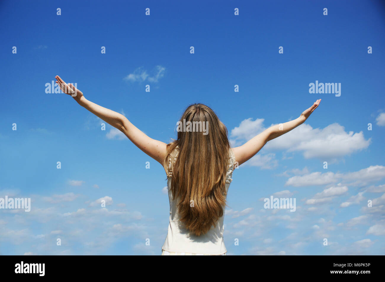 beautiful girl on sky Stock Photo - Alamy
