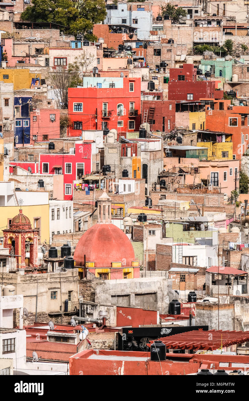 Cramped colorful houses and churches on steep hill of Guanajuato ...