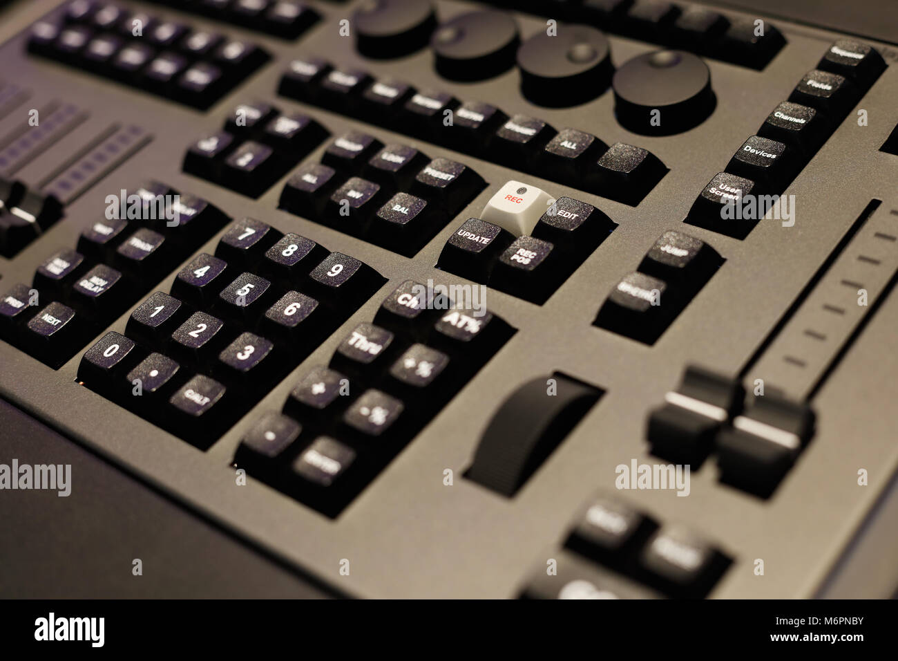 Closeup of the front panel of lighting control console. Selective focus ...