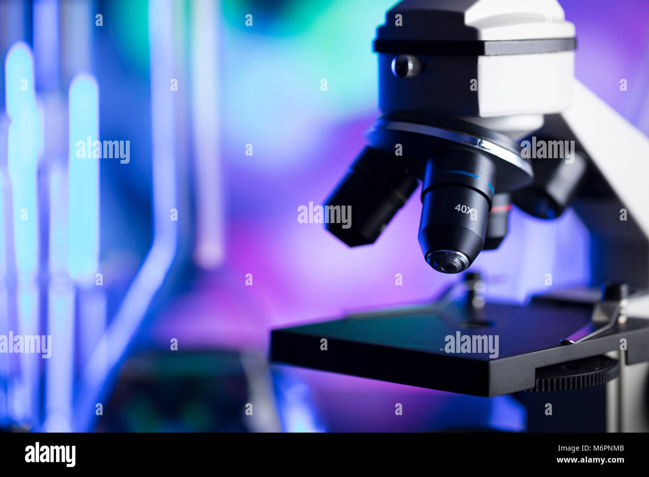 Science concept background. Microscope and laboratory glassware ...