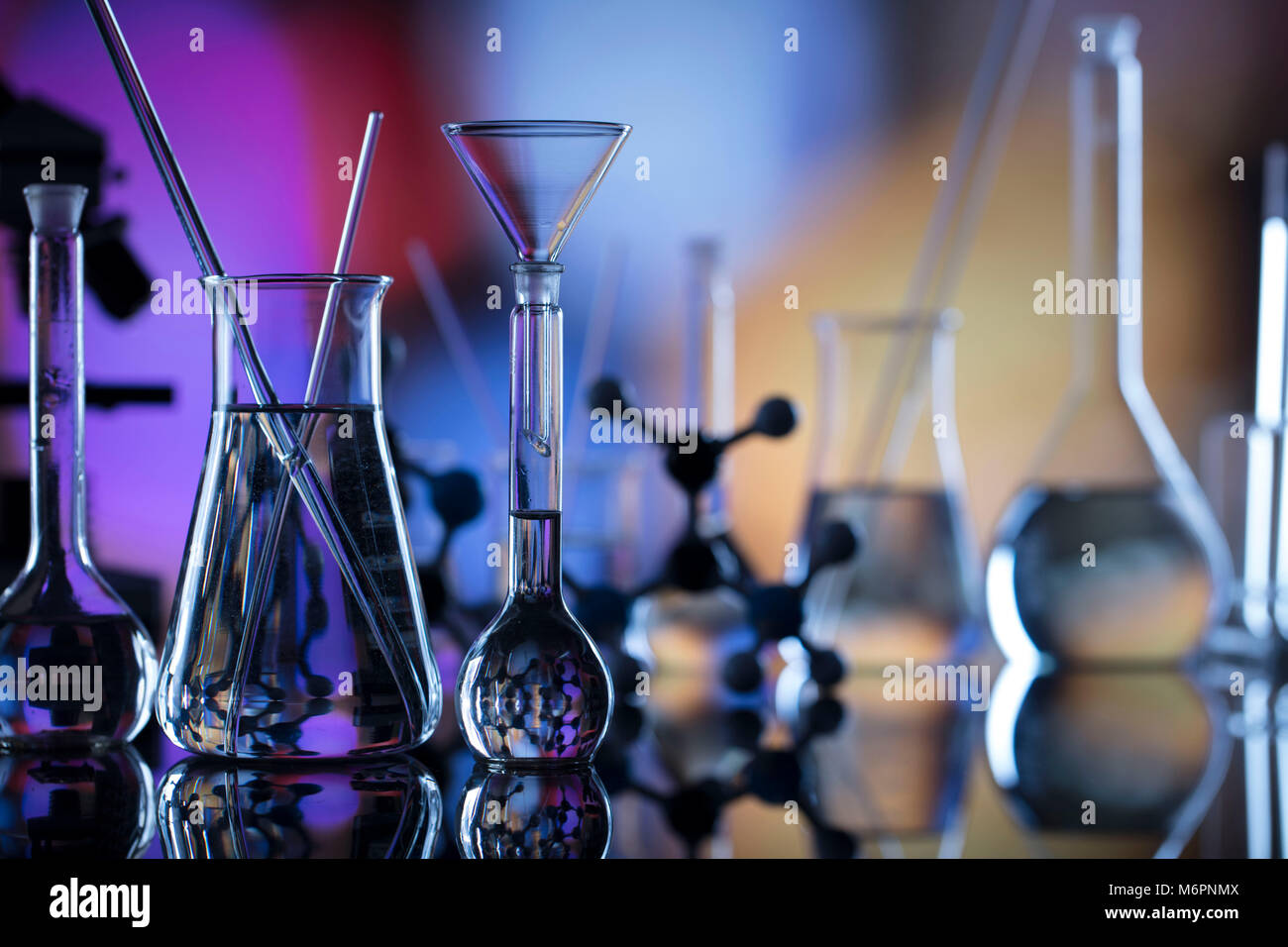 Science concept background. Microscope and laboratory glassware ...