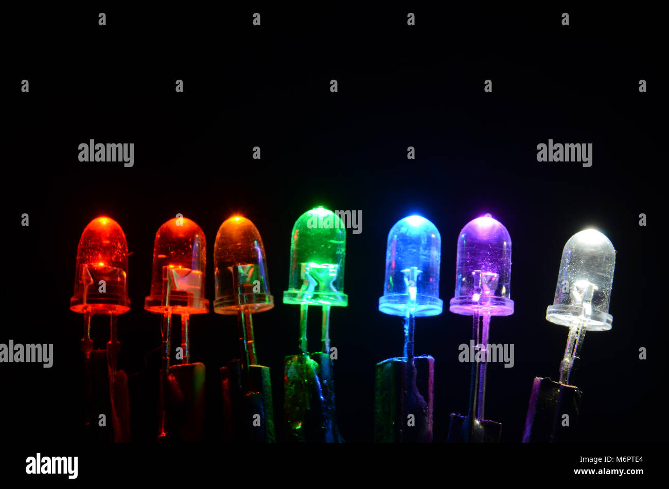 Row of colored LEDs seen in side view on a dark background Stock Photo ...