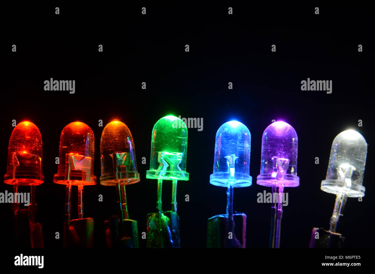Row of colored LEDs seen in side view on a dark background Stock Photo ...