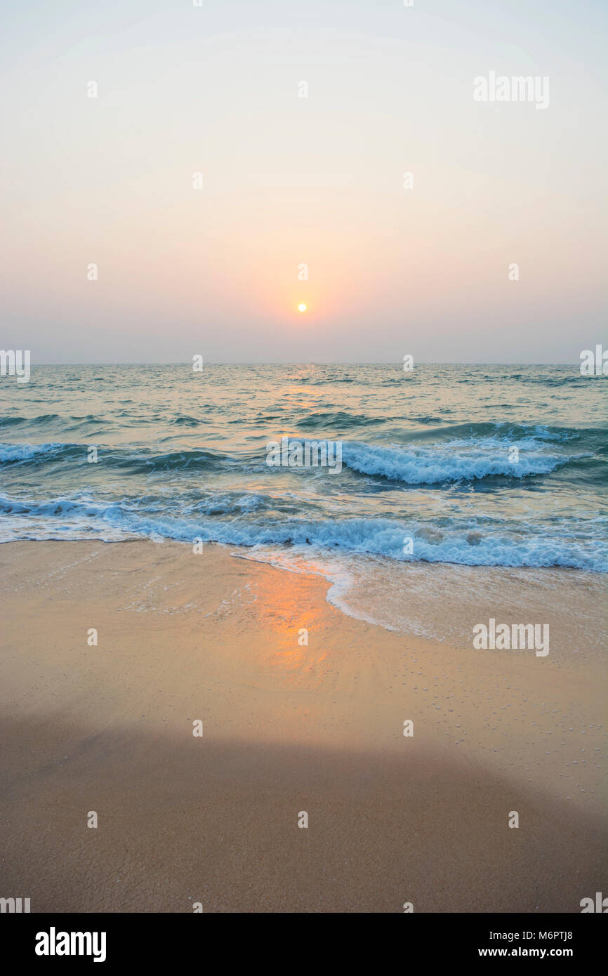 sunset over Beach and tropical sea- India Stock Photo - Alamy