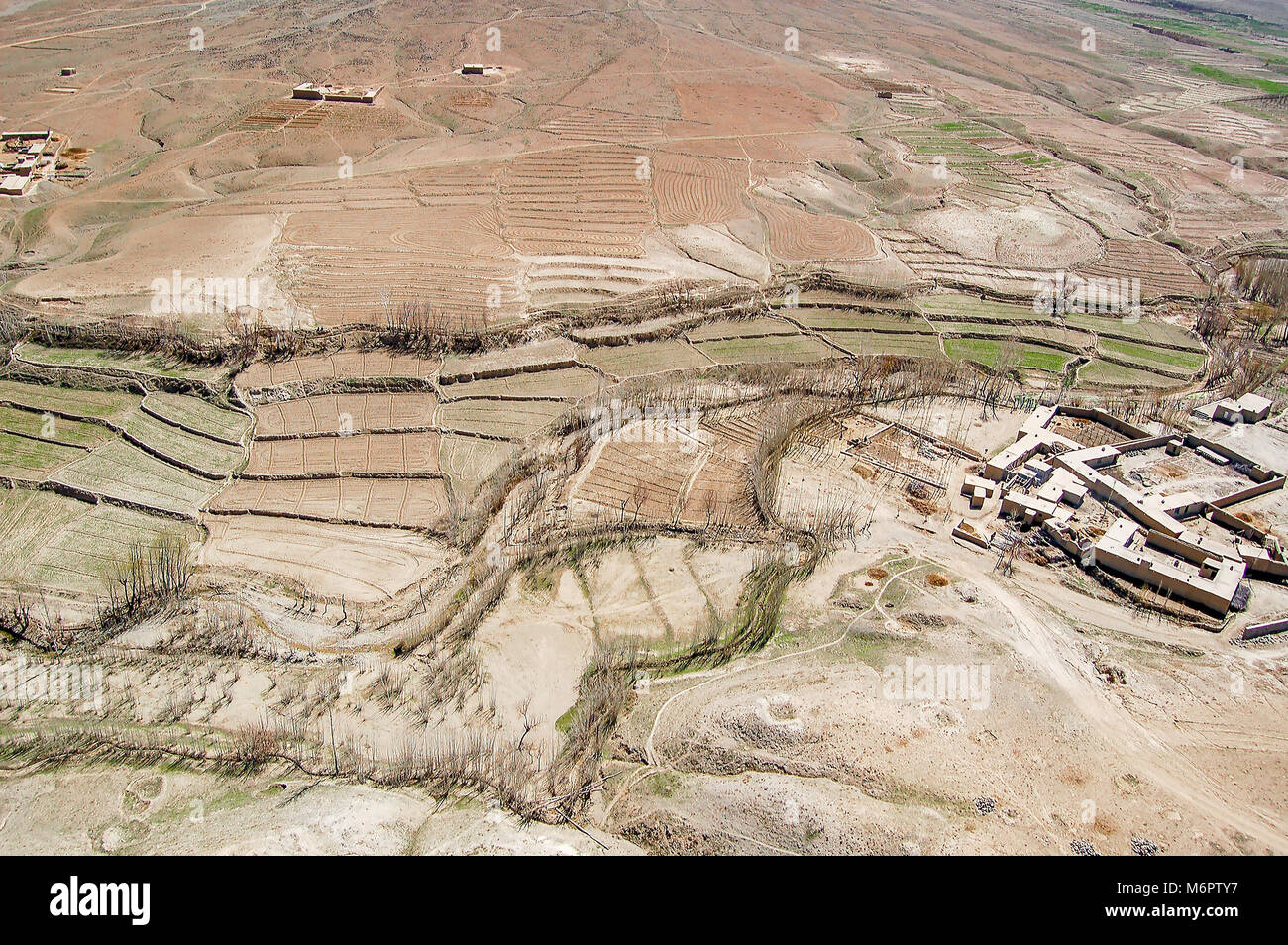 Aerial photo of a large mud compound between Kabul and Ghazni in ...
