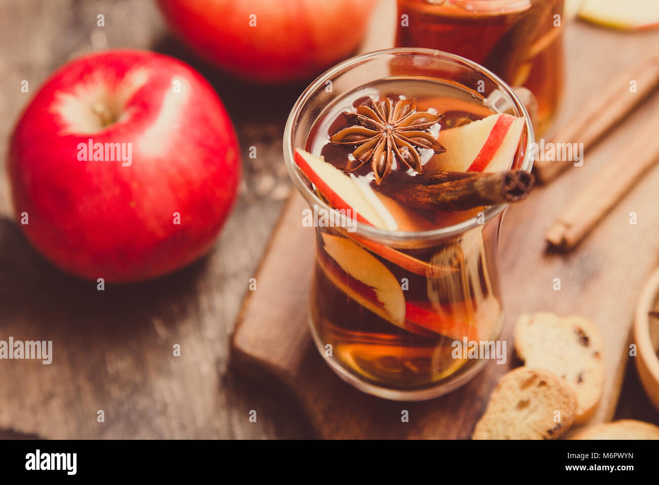 hot spicy beverage. Hot drink (apple tea, punch) with cinnamon stick ...