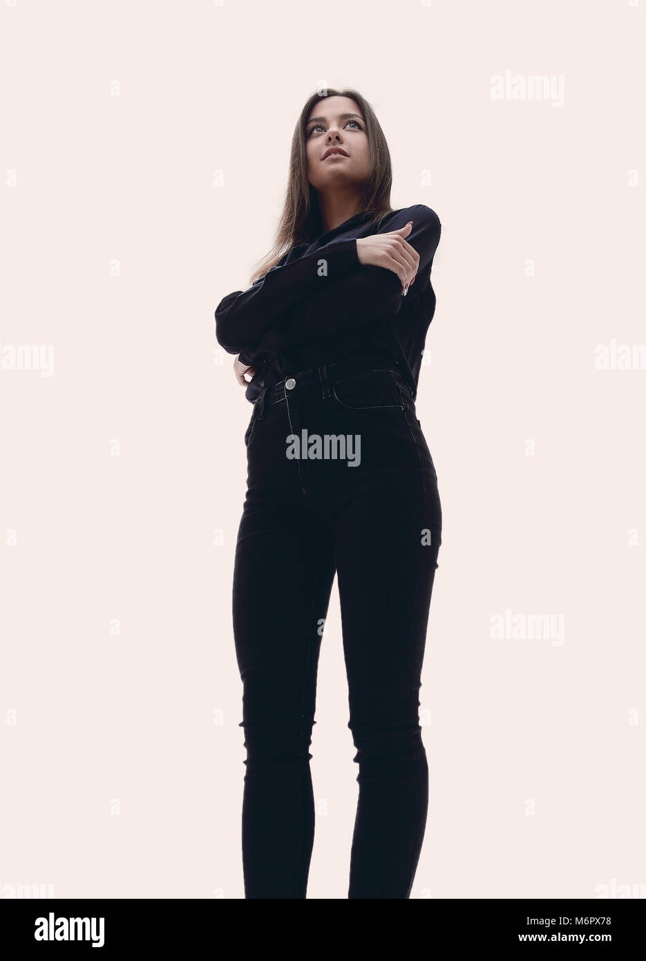 View from below young business woman standing Stock Photo - Alamy