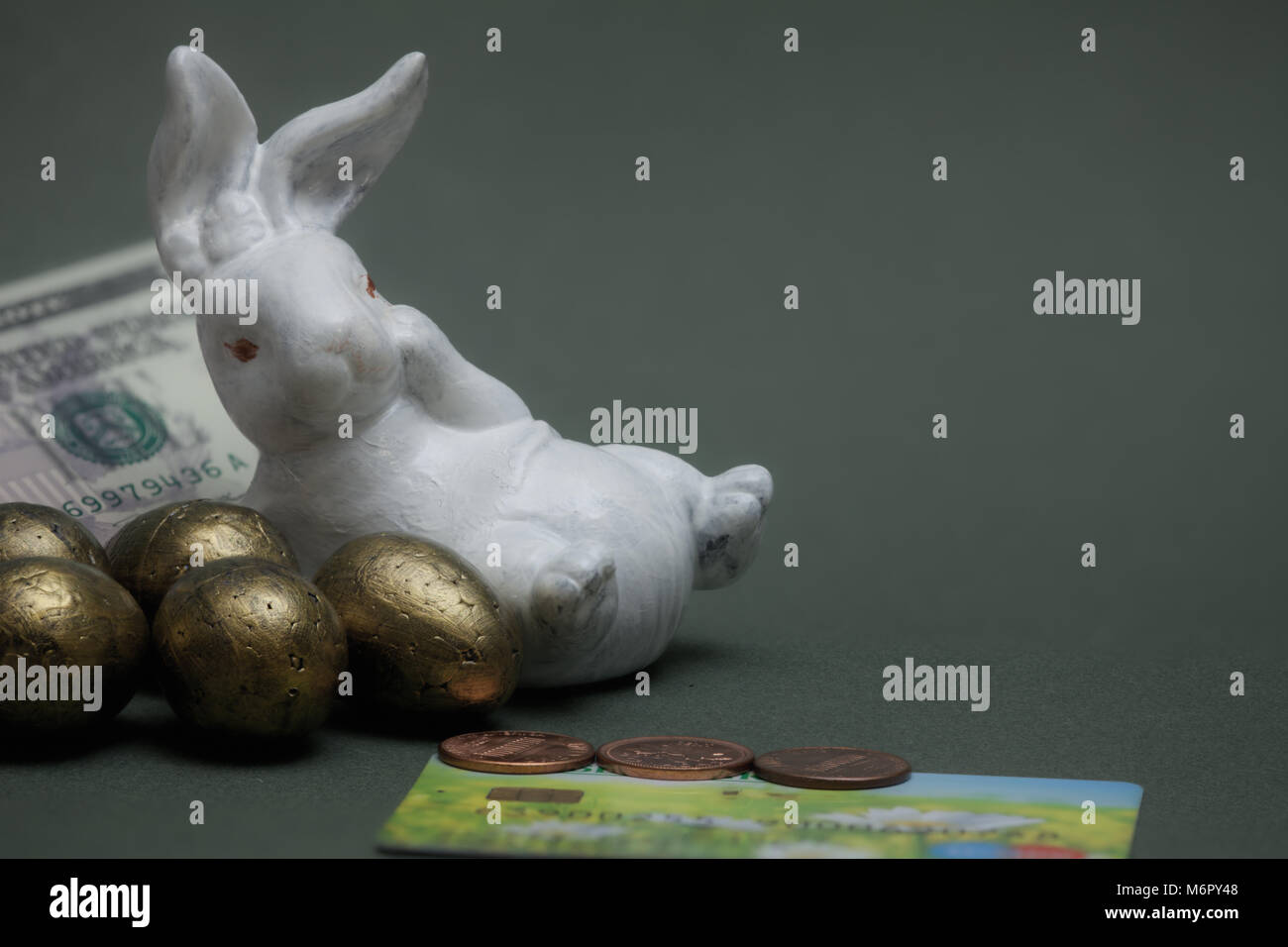 rich rabbit with money still life Stock Photo - Alamy