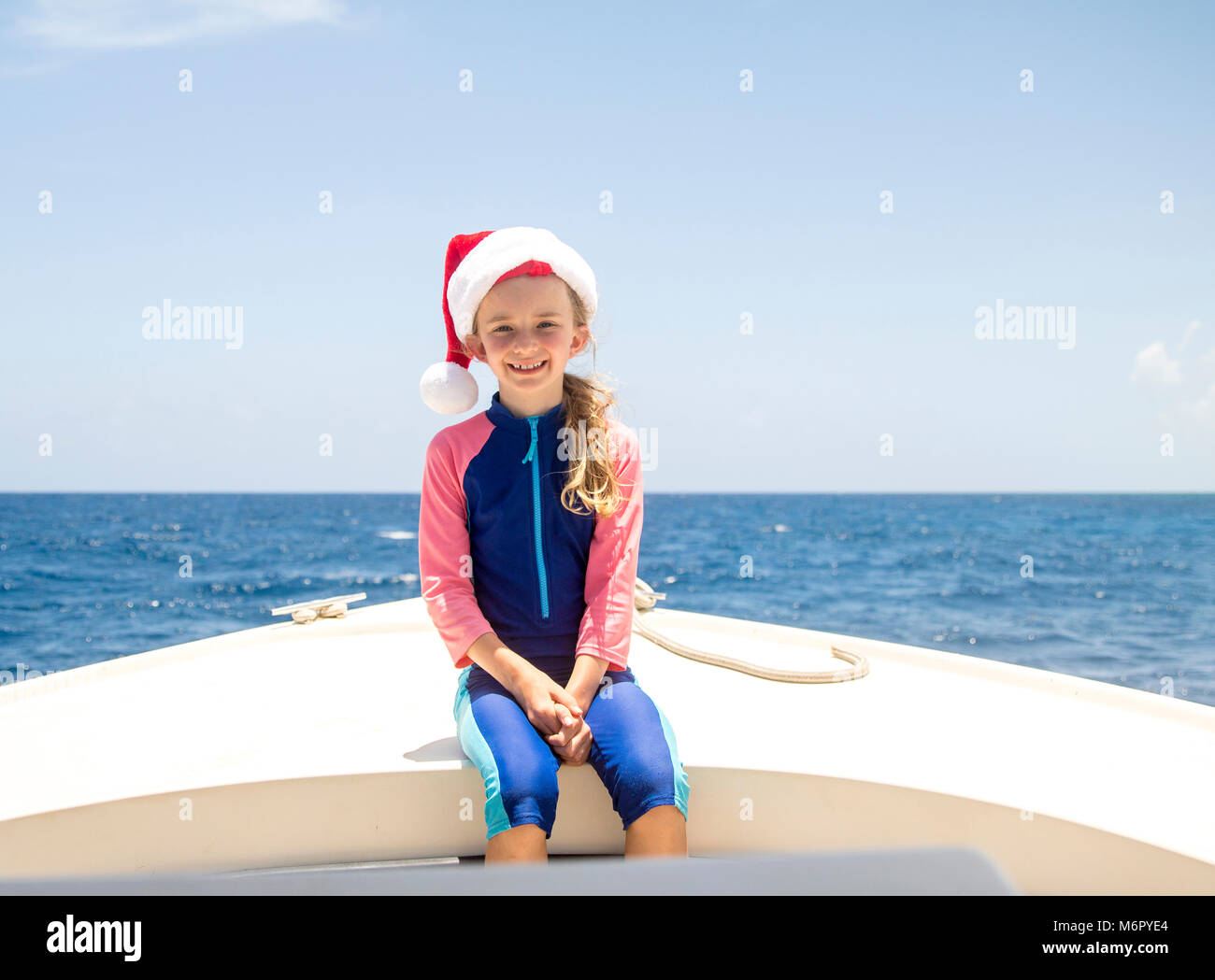 Girl wearing wetsuit hi-res stock photography and images - Alamy