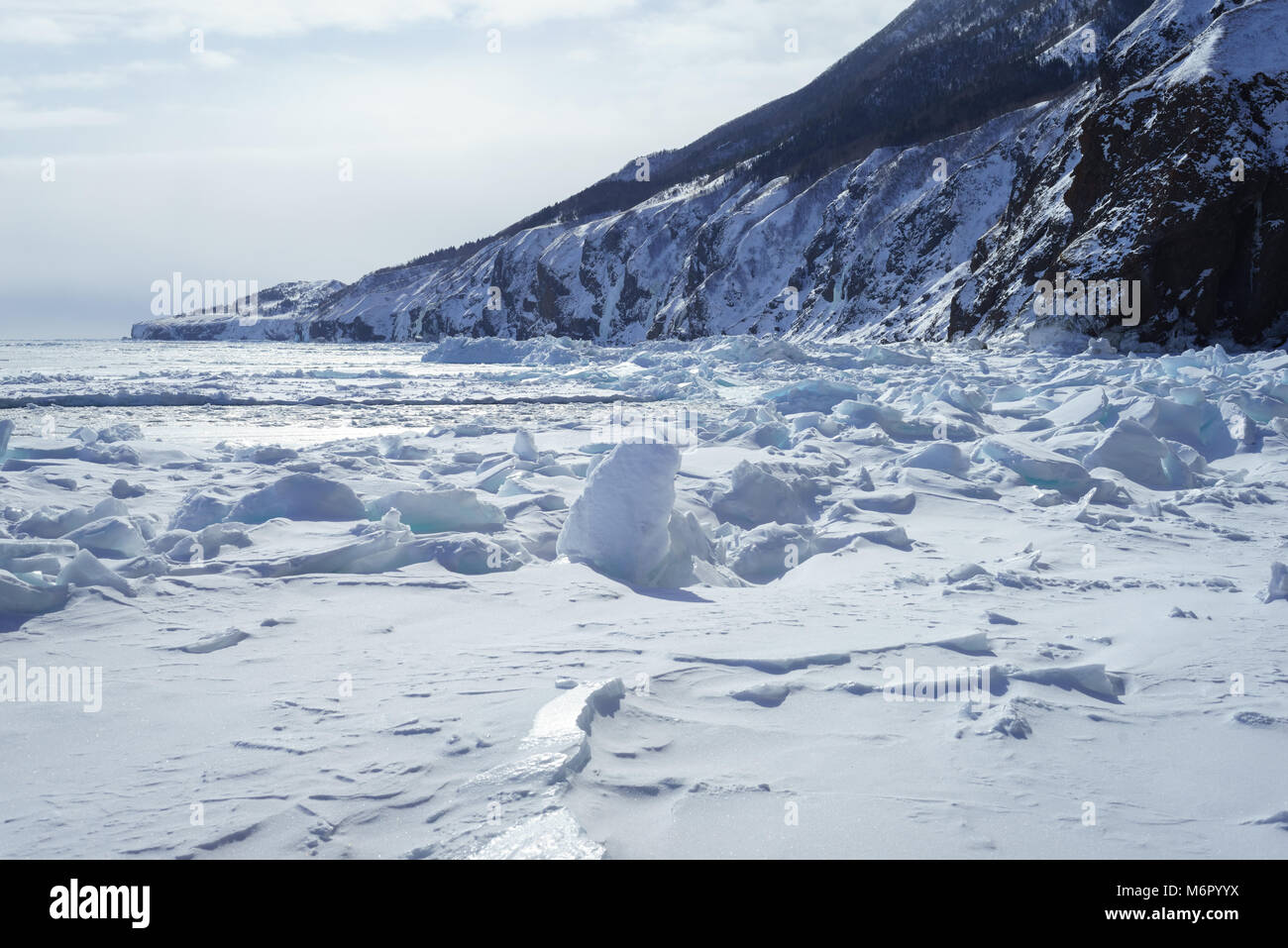 Ice covered sea coast of the Okhotsk Sea, Sakhalin Island, Russia Stock ...