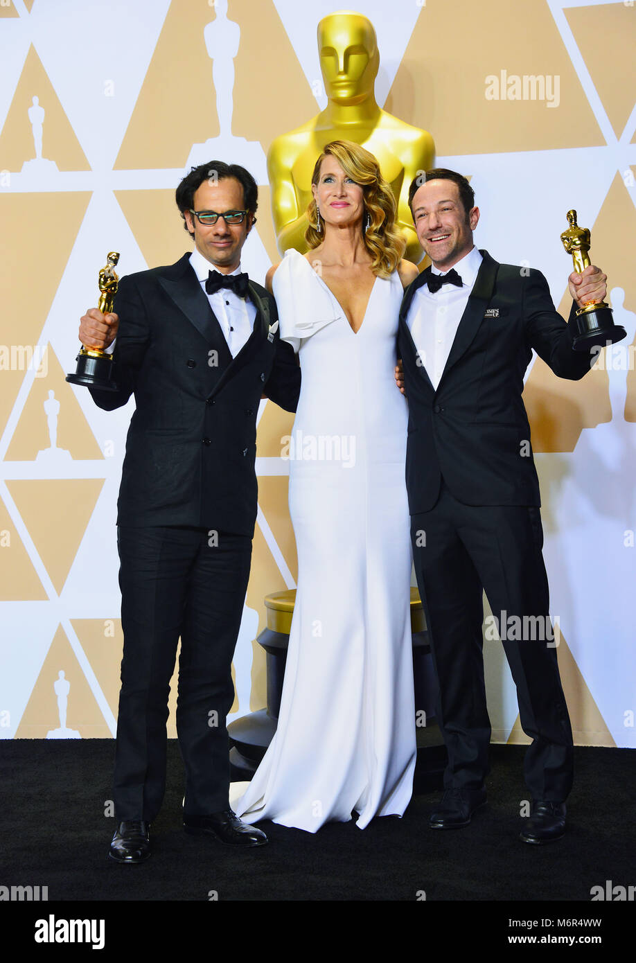 Laura Dern (C) poses with producers Dan Cogan (L) and director Bryan ...
