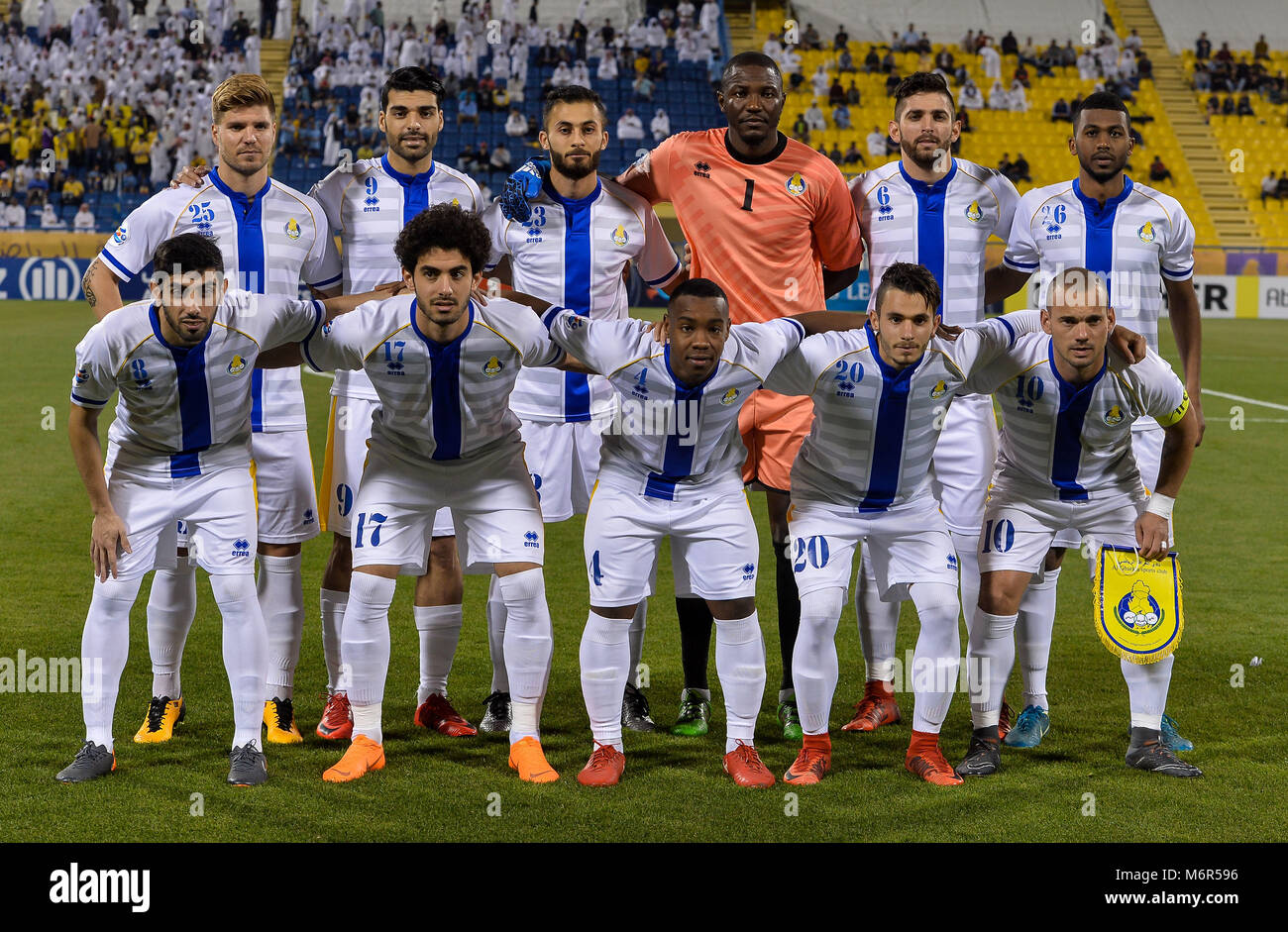 Doha, Capital of Qatar. 5th Mar, 2018. Players of Al-Gharafa line up ...