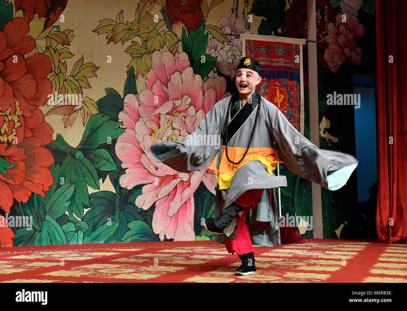 Beijing, China. 6th Mar, 2018. Peking opera performer Jiao Jingge ...