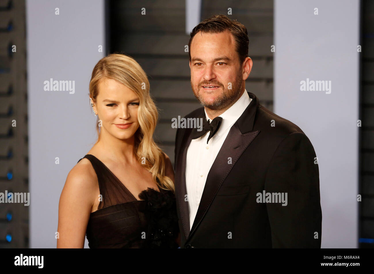Kelly Sawyer and Jamie Patricof attending the 2018 Vanity Fair Oscar ...