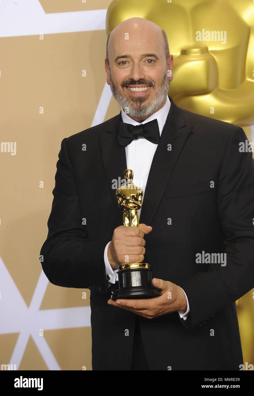 Costume designer Mark Bridges poses in the press room of the 90th ...