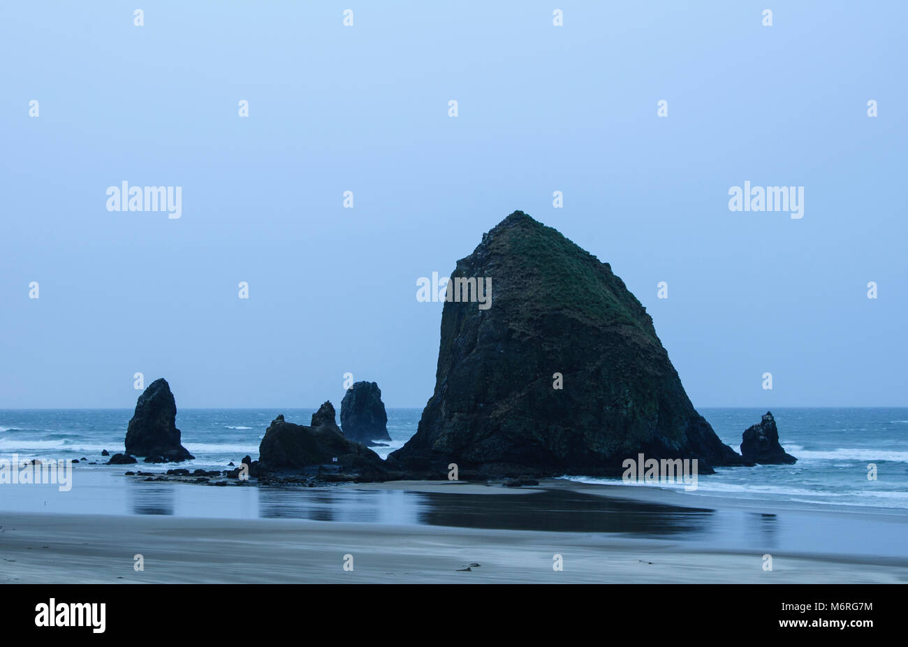 Cannon Beach, Oregon. Haystack rock, part of the Tolovana Beach State ...