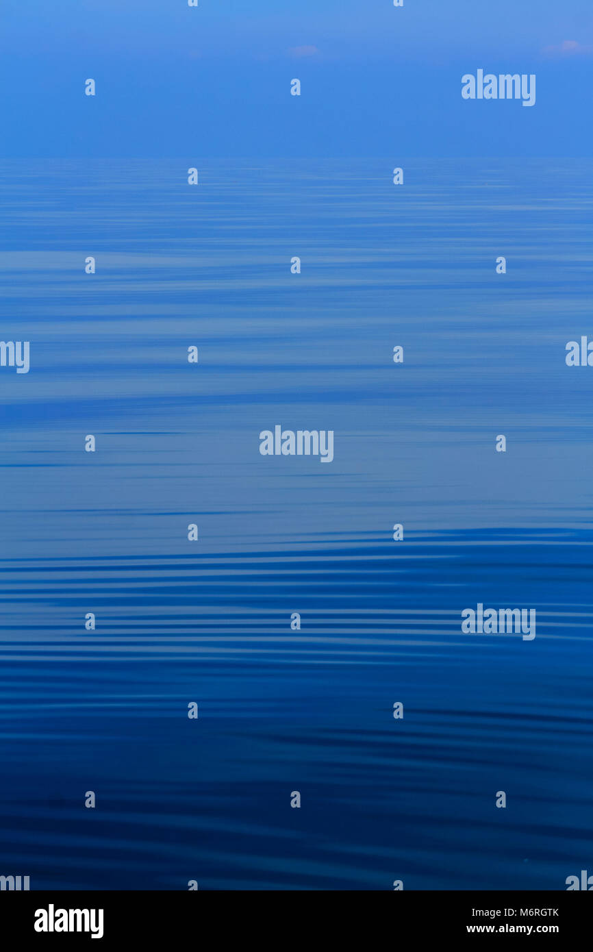 ripple a small wave or series of waves on the surface of water ...