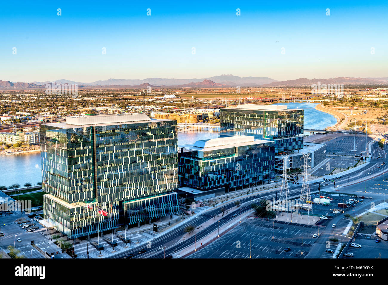 An overlook from atop Mountain Butte of sunset over downtown Phoenix ...