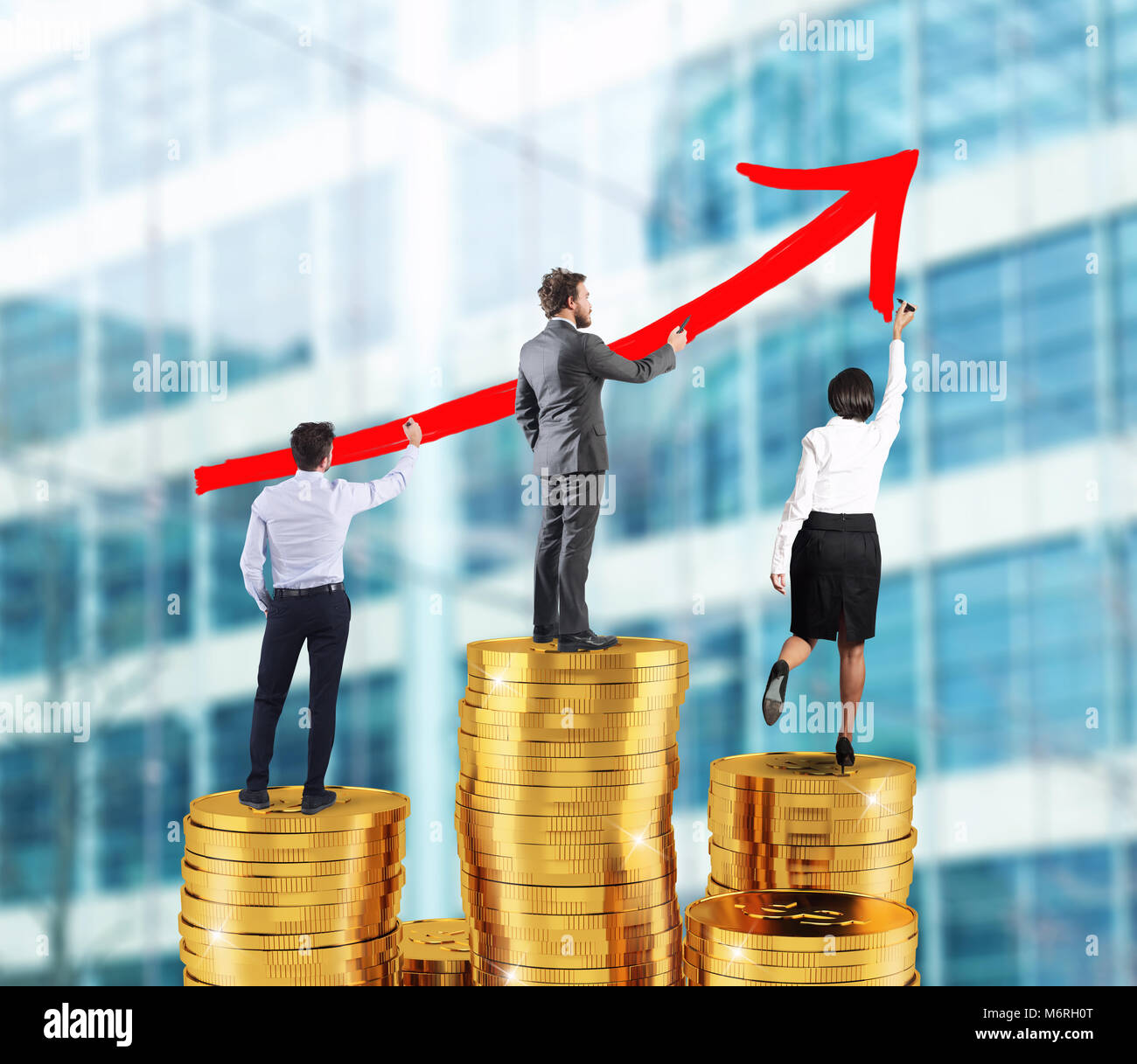 Business team draws growing arrow of company statistics over the piles ...