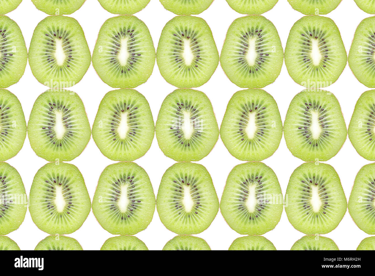 Green kiwi fruit pattern abstract on white background Stock Photo - Alamy