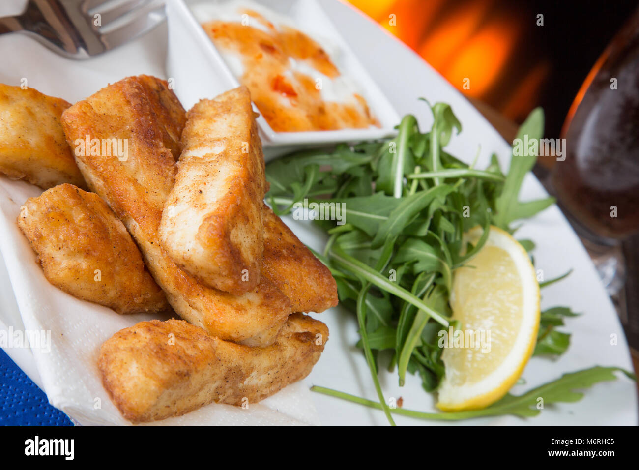 A starter course of Halloumi cheese fries with a Rocket salad and ...