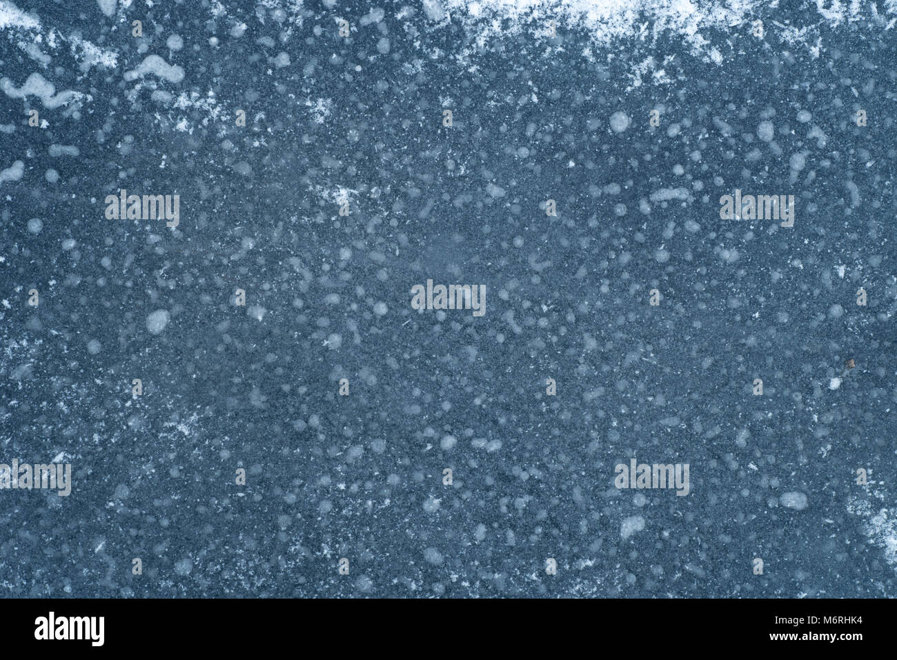 blue ice with snow background texture Stock Photo - Alamy