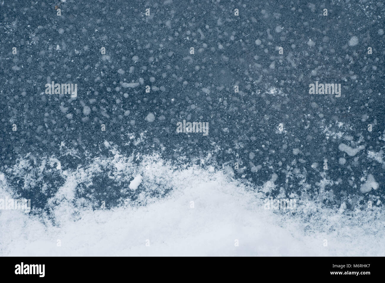 blue ice with snow background texture Stock Photo - Alamy