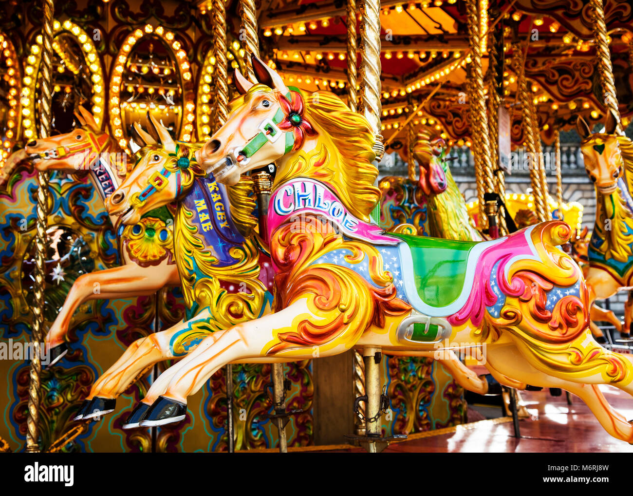 Old Fashioned Carousel at a Funfair Stock Photo - Alamy