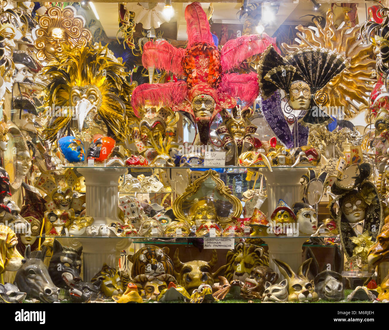 Venetian carnival masks' shop display window in Venice Stock Photo - Alamy